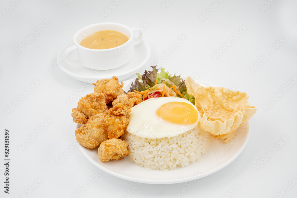 Buttermilk chicken rice with ingredients isolated on white with fried ...