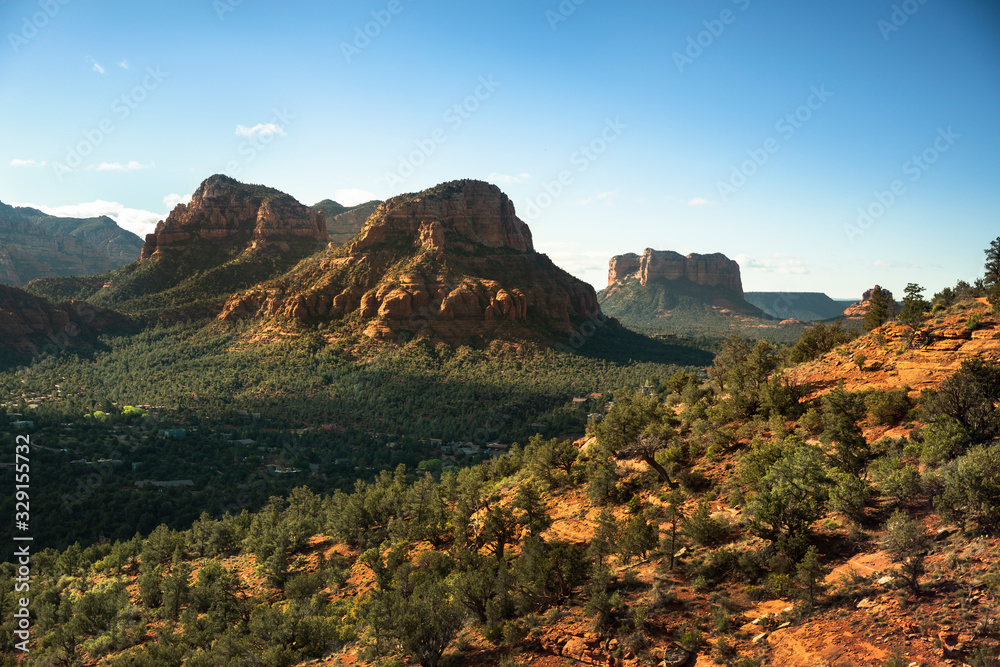 Elephant Rock, Courthouse Butte, and Bell Rock formation over the town ...