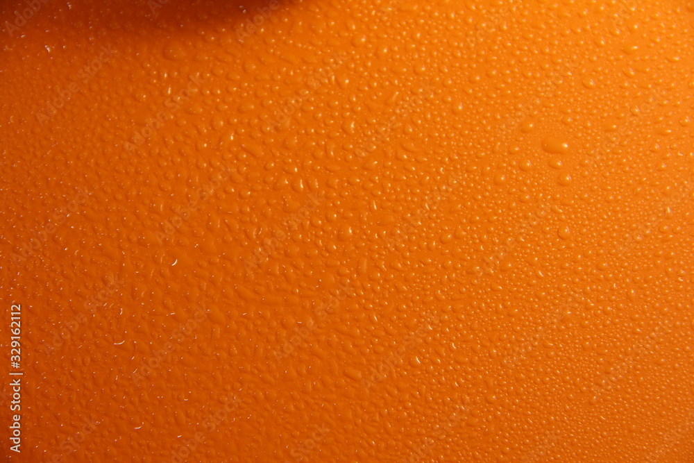 Wet orange background. Bright texture with water drops. Stock Photo ...