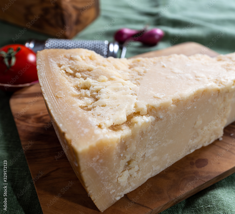 One piece of authentic Parmigiano-Reggiano or Parmesan Italian hard ...