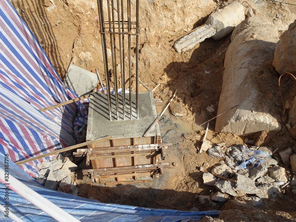 Pile cap and column stump under construction at the construction site ...