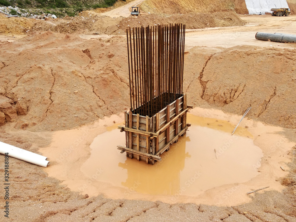 Pile cap and column stump under construction at the construction site ...