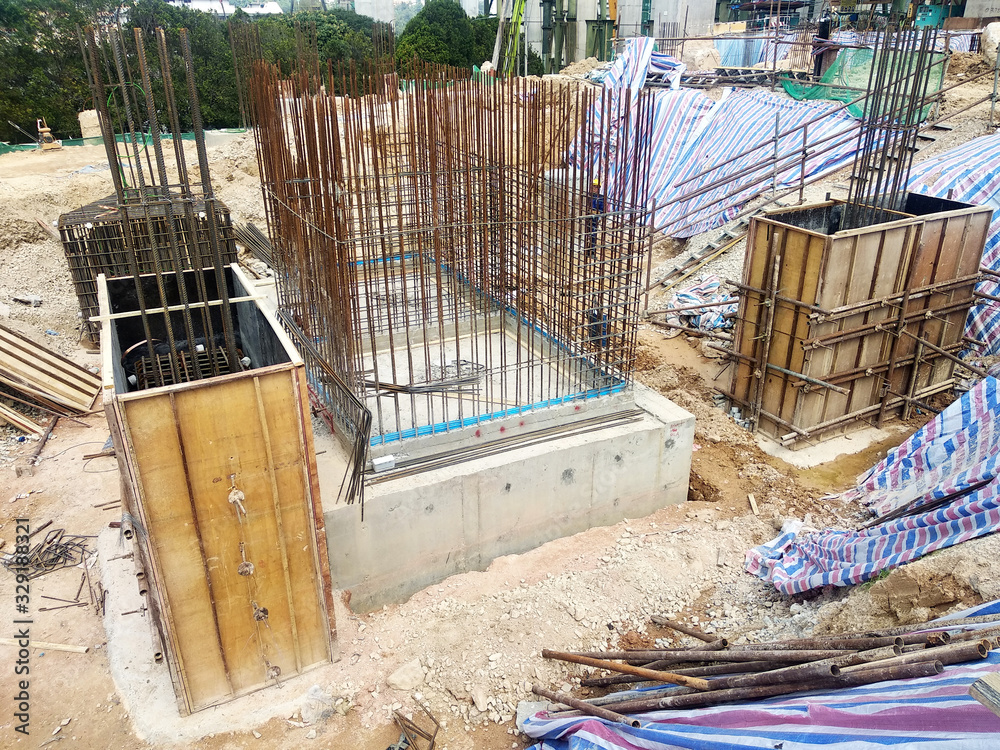 Pile cap and column stump under construction at the construction site ...