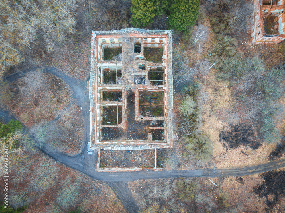 Aerial view of the old abandoned brick building without roof, looks ...