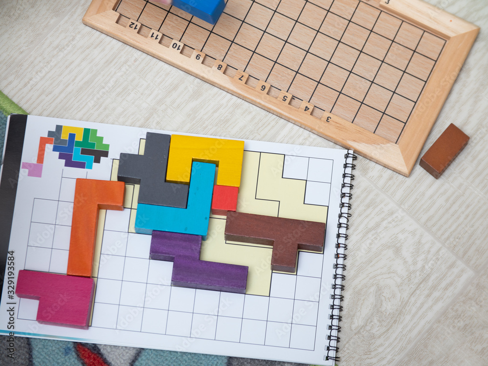 Children play a Board game. Educational games for children. the ...