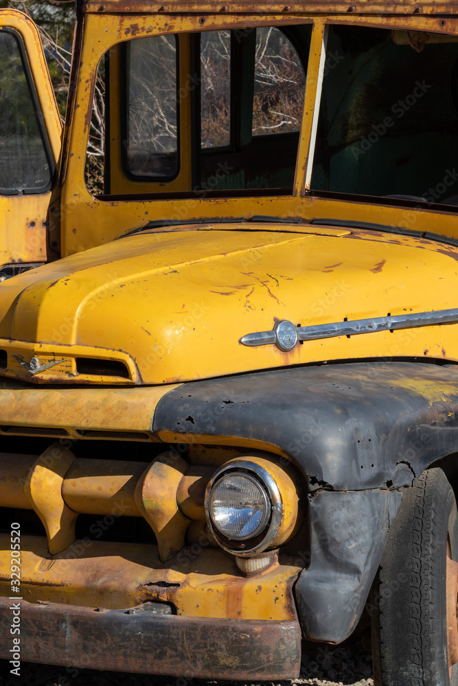 Old rusty vintage yellow school bus front Stock Photo | Adobe Stock