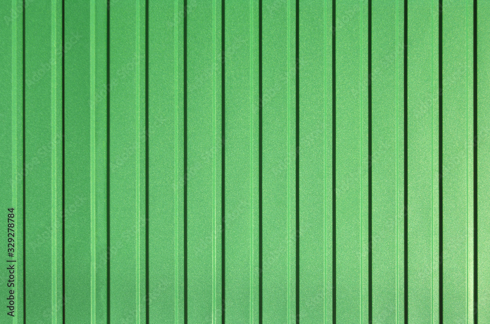 Green background of metal wall siding, cladding. Stock Photo | Adobe Stock