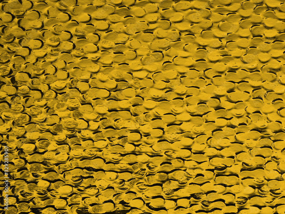 Gold stained glass window texture. Closeup of frosted glass texture ...