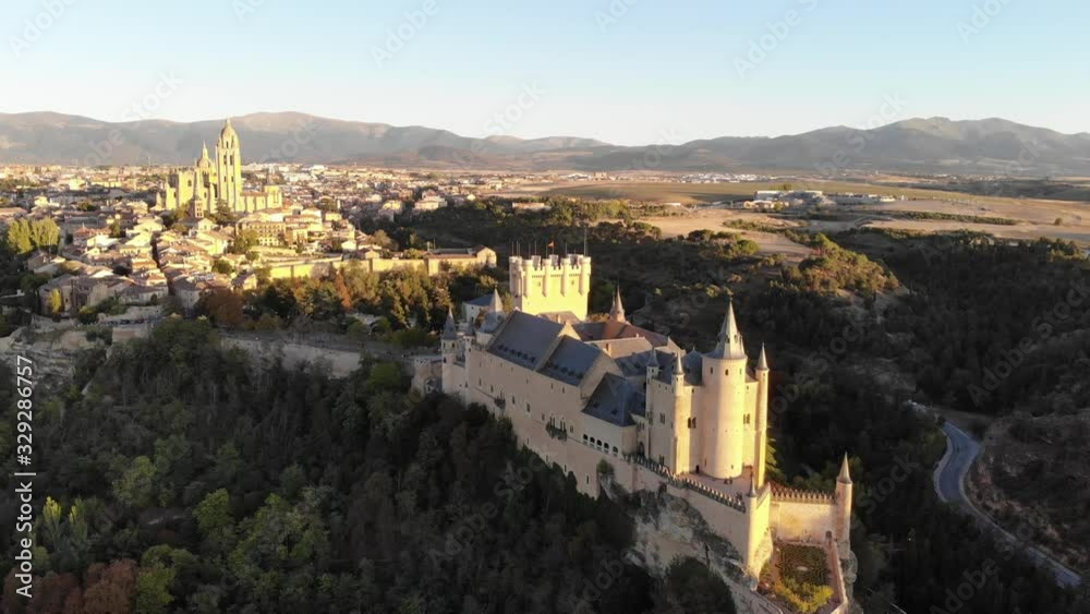 Sunset light on the alcazar in the spanish citadel of Segovia. Antique ...