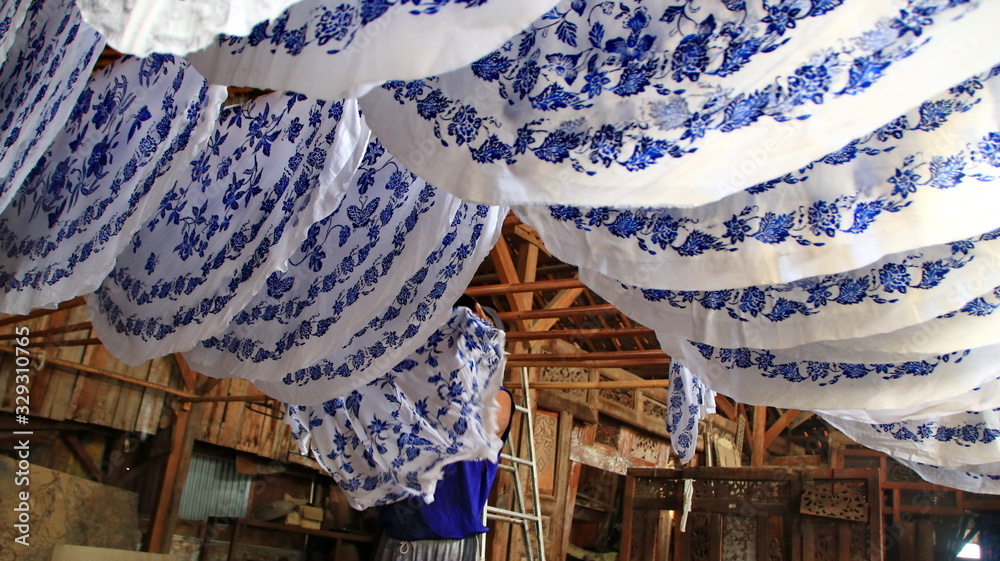 Activity of making batik, Create and design white fabric using canting ...