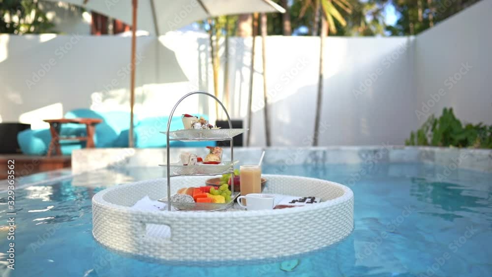 Floating breakfast, brunch served in swimming pool, fine dining idea ...