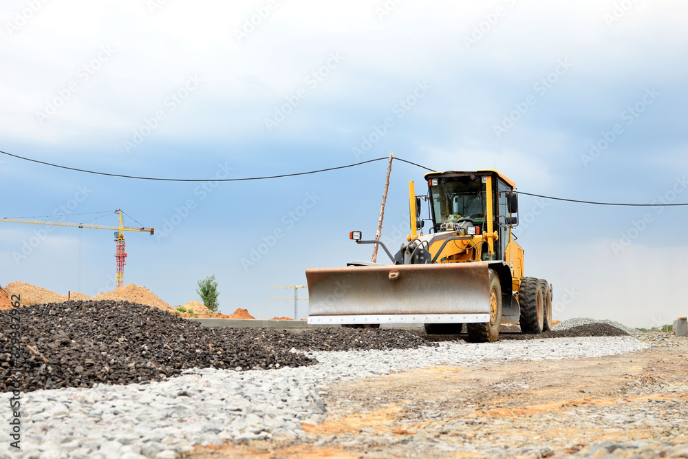Сonstruction machine Motor Grader at a construction site level the ...