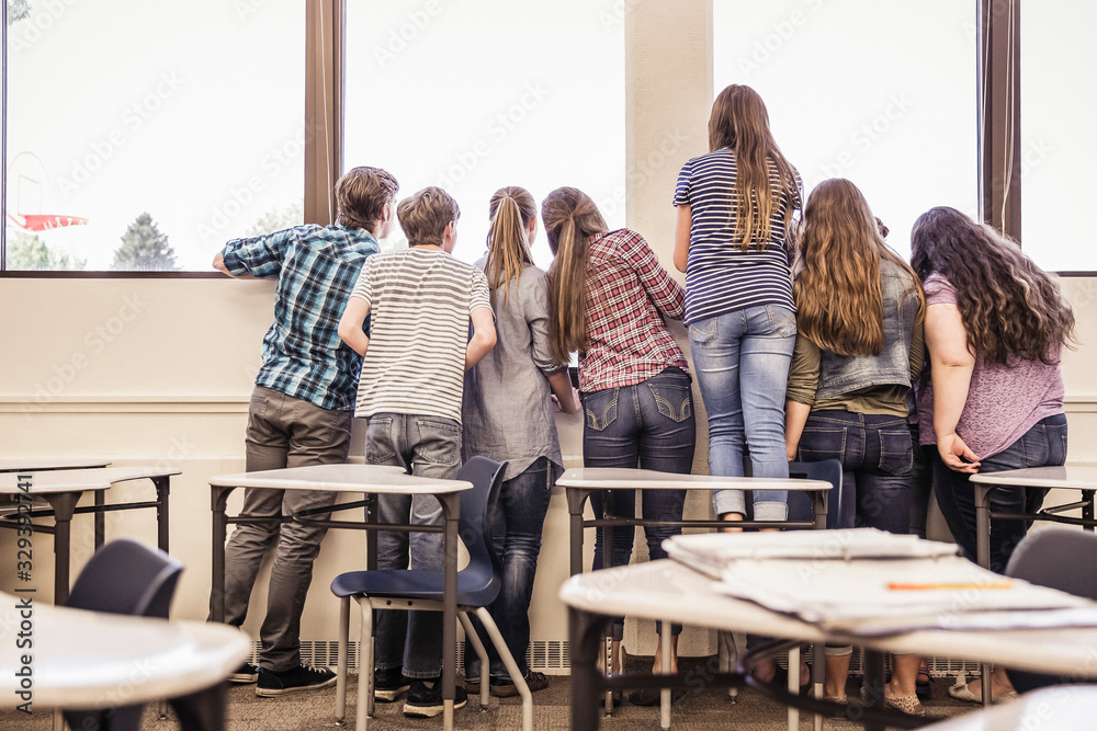 School kids in school classroom all looking out the window. Red Lodge ...