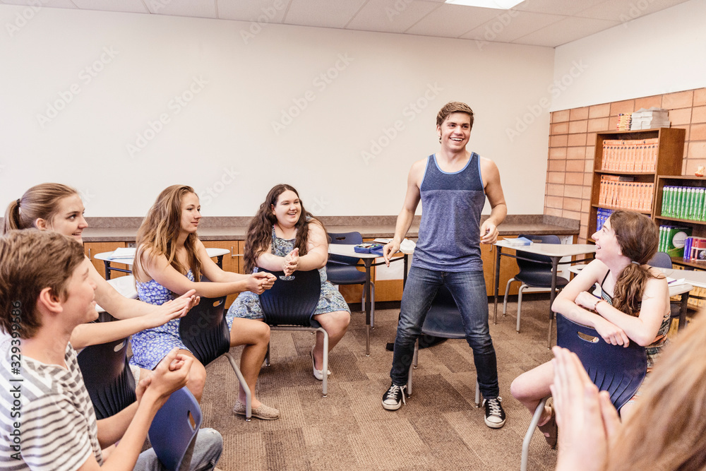 Teenage school kids doing team building activities in class. Red Lodge ...