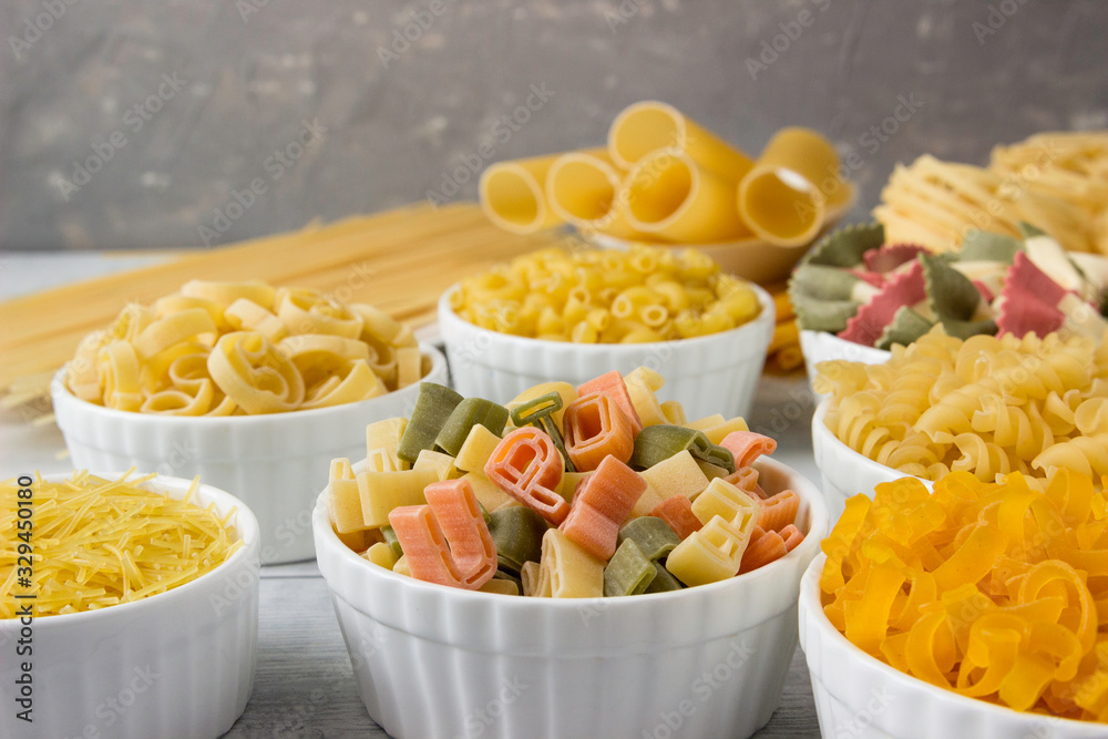 Different varieties of dry pasta and its various types. Stock Photo ...