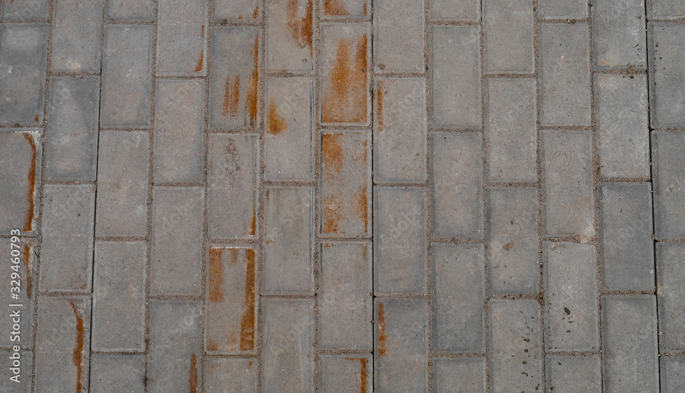 Foto de Paving. Texture of paving stones on the street. Broken paving ...