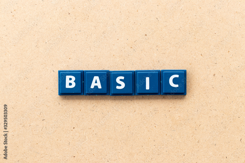 Tile letter in word basic on wood background Stock Photo | Adobe Stock