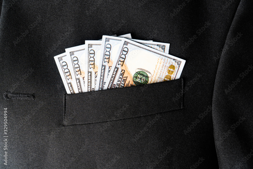 Fotografia do Stock: money in a jacket pocket Concept image of Business ...