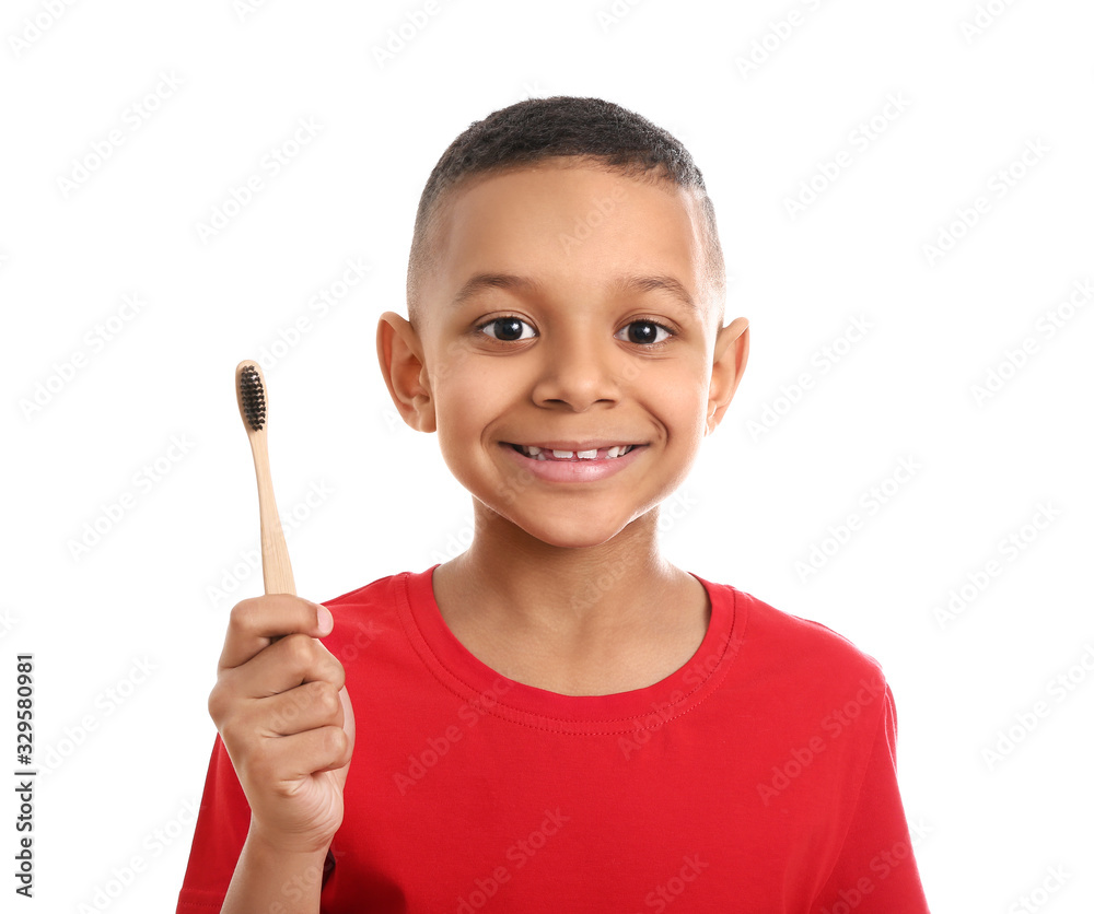 Little African-American boy with tooth brush on white background Stock ...
