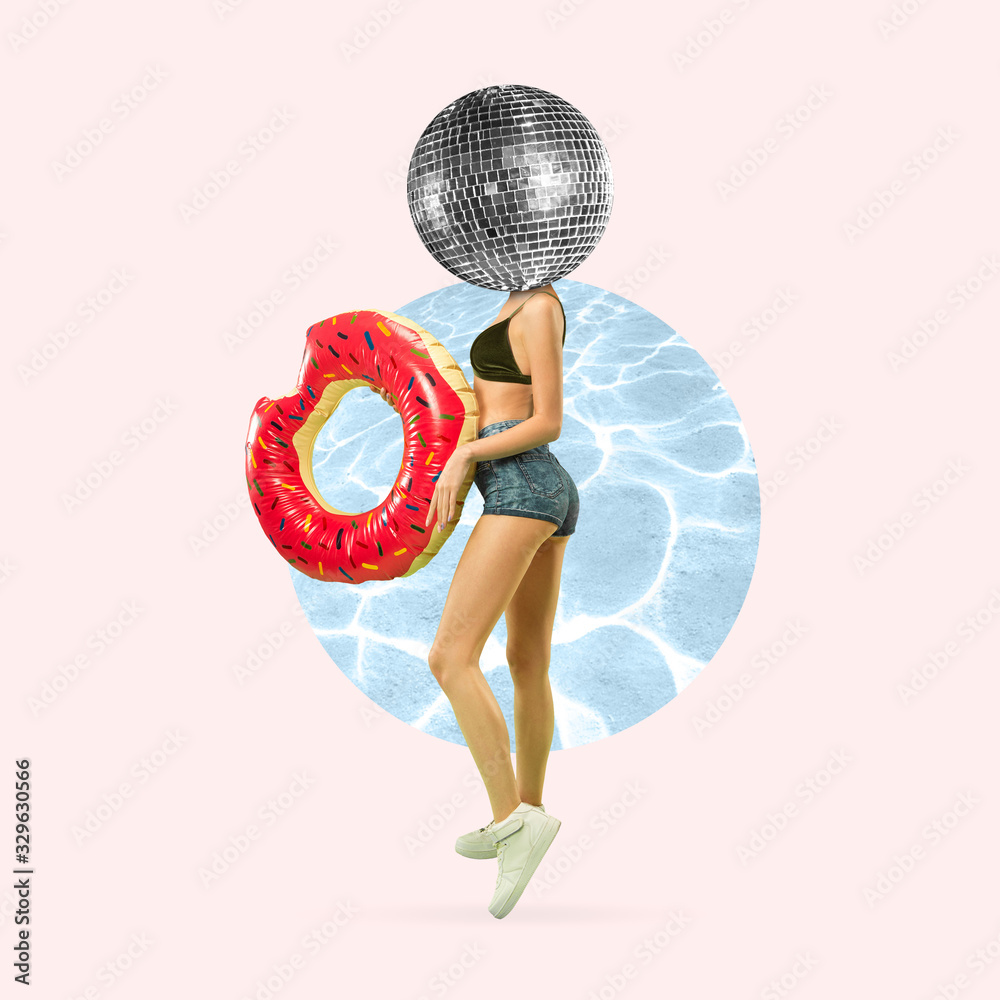 Ready for swimming. Fit female body headed by big disco ball on pool ...