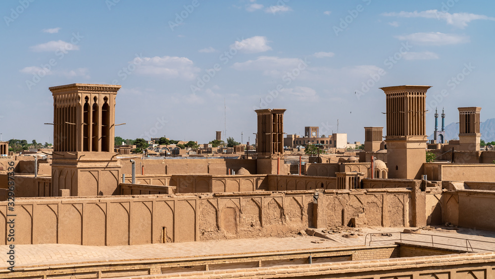 Yazd cityscape with old brick buildings and badgirs wind catching ...