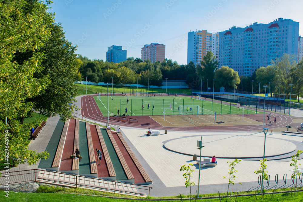 Top view Stadium and athletic fields in a Park among residential ...
