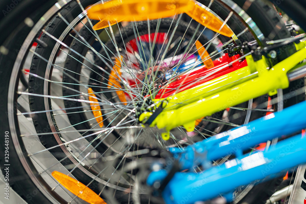 Lots of bicycle wheels in a bike shop Stock Photo | Adobe Stock