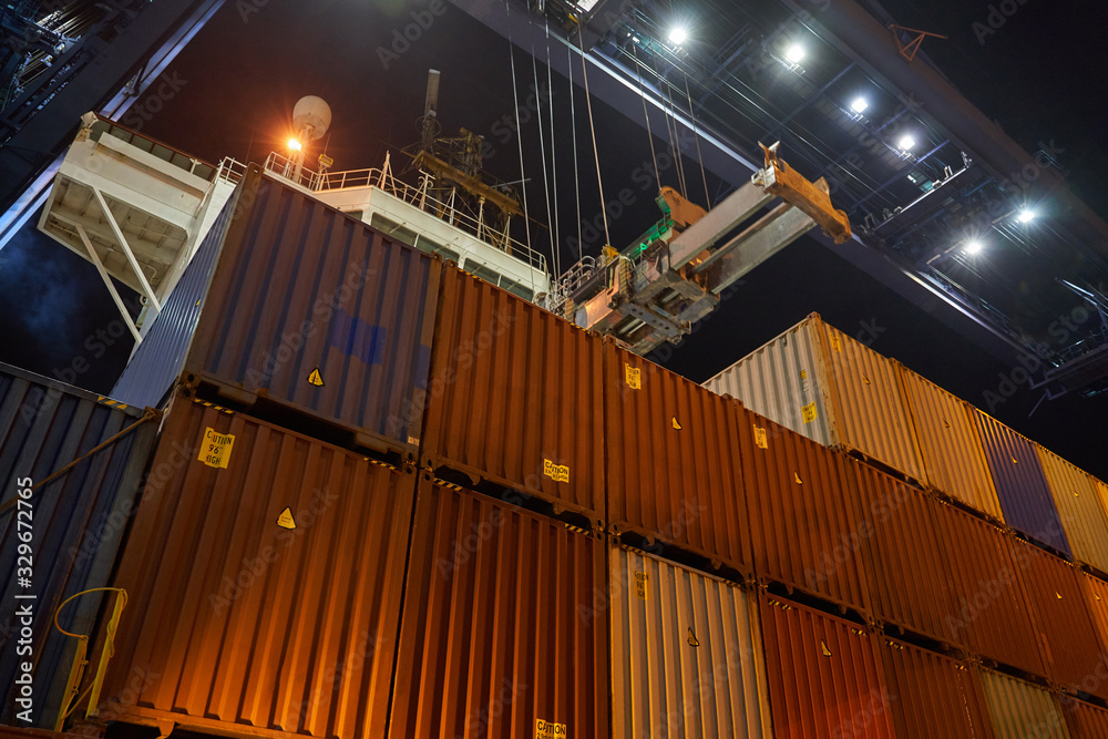 Container ship in port at container terminal. Ships of container ships ...