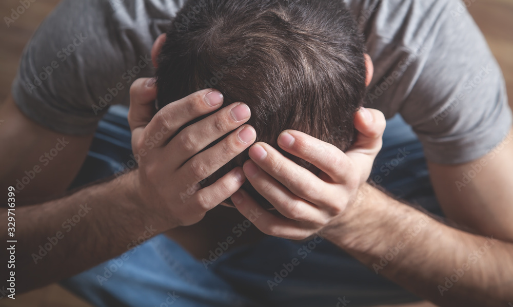 Caucasian depressed man at home. Mental health Stock Photo | Adobe Stock