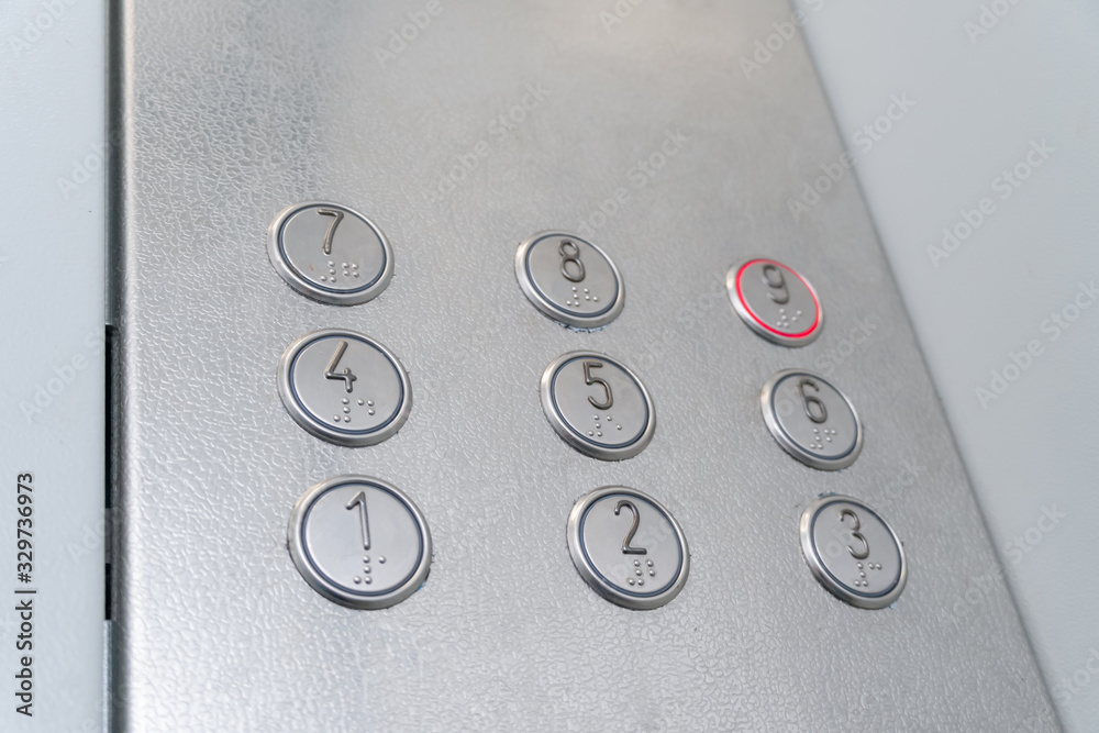 Elevator buttons with Braille, the system highlights the button for the ...