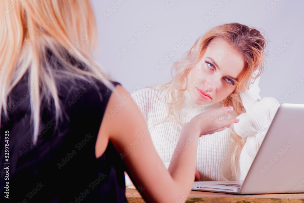 Conflict between boss and employee. Portrait of exhausted female worker ...