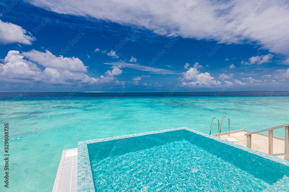 Minimalist infinity pool in tropical paradise beach. Luxury resort ...