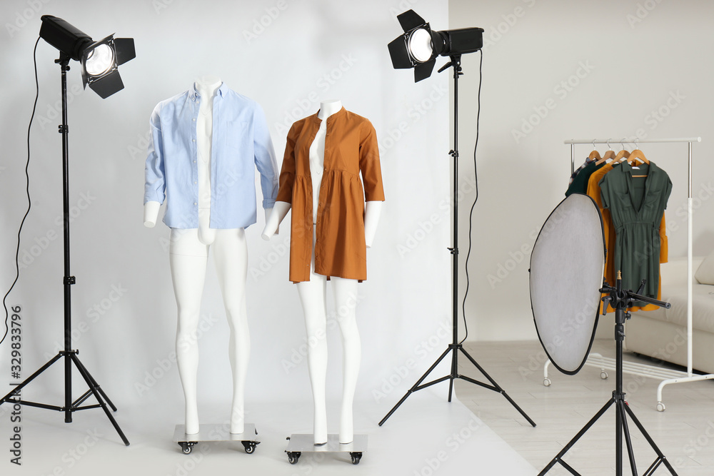 Ghost mannequins with modern clothes in professional photo studio Stock ...