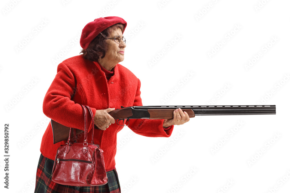 Grandmother in a red coat holding a shotgun Stock Photo | Adobe Stock