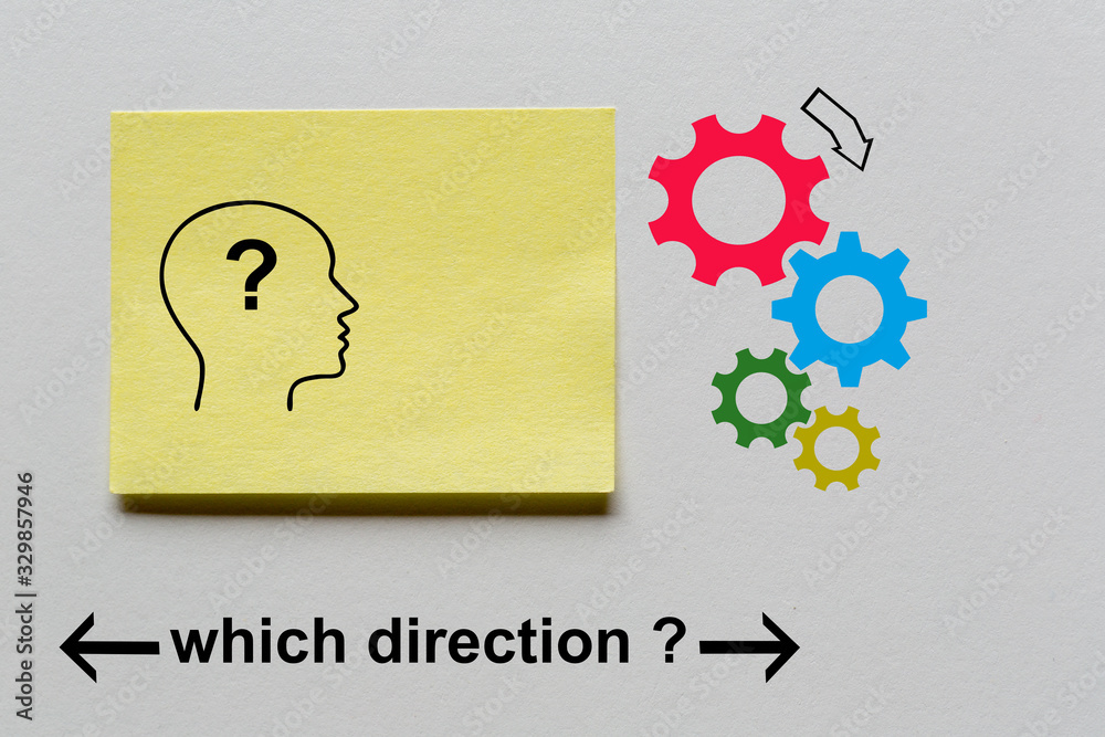 yellow note sticker with silhouette of a head with question mark and ...
