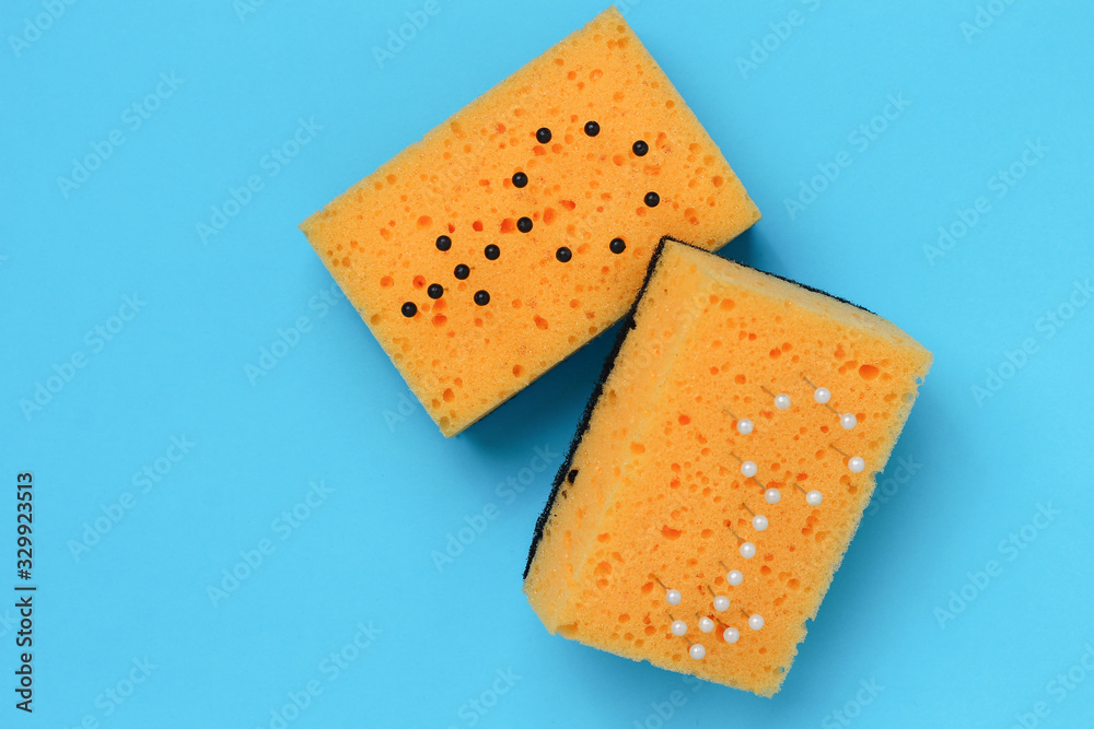 Abstract signs of man and woman made by needles in sponges for washing ...