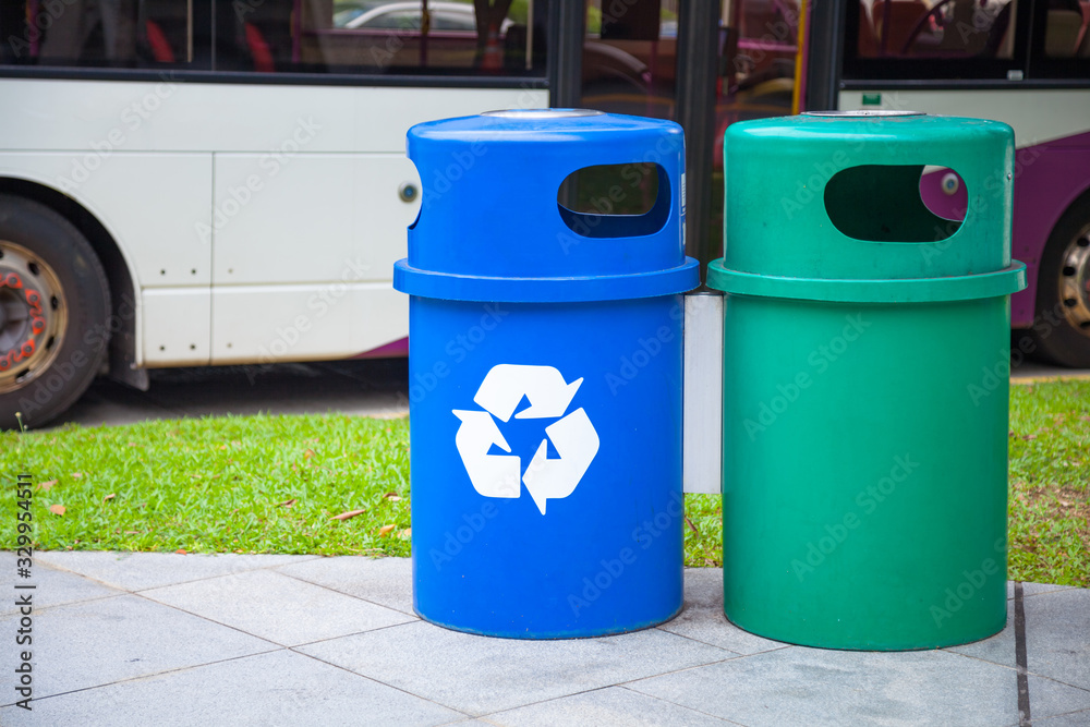 Blue Recycling Bin collects recyclables or recycled material like glass ...