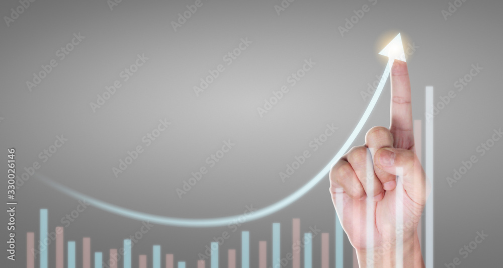 Hand touching graphs of financial indicator and accounting market ...