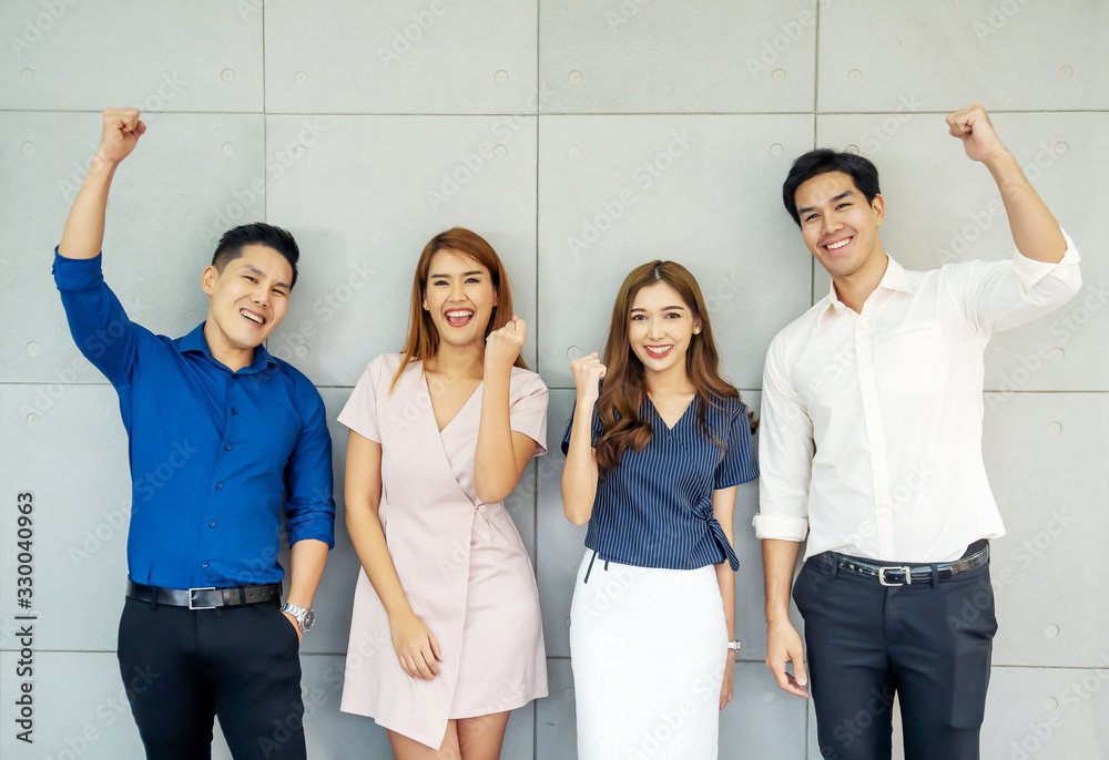 Business winners. Feeling confident in his team. Group of happy young ...