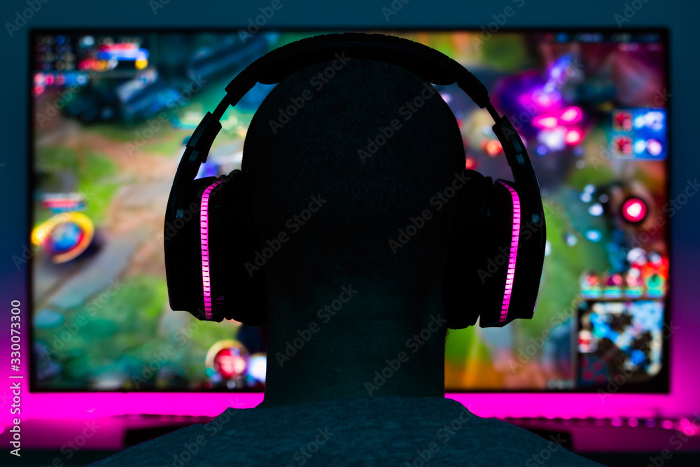 Foto de Stock photo of a gamer man playing a video game do Stock ...