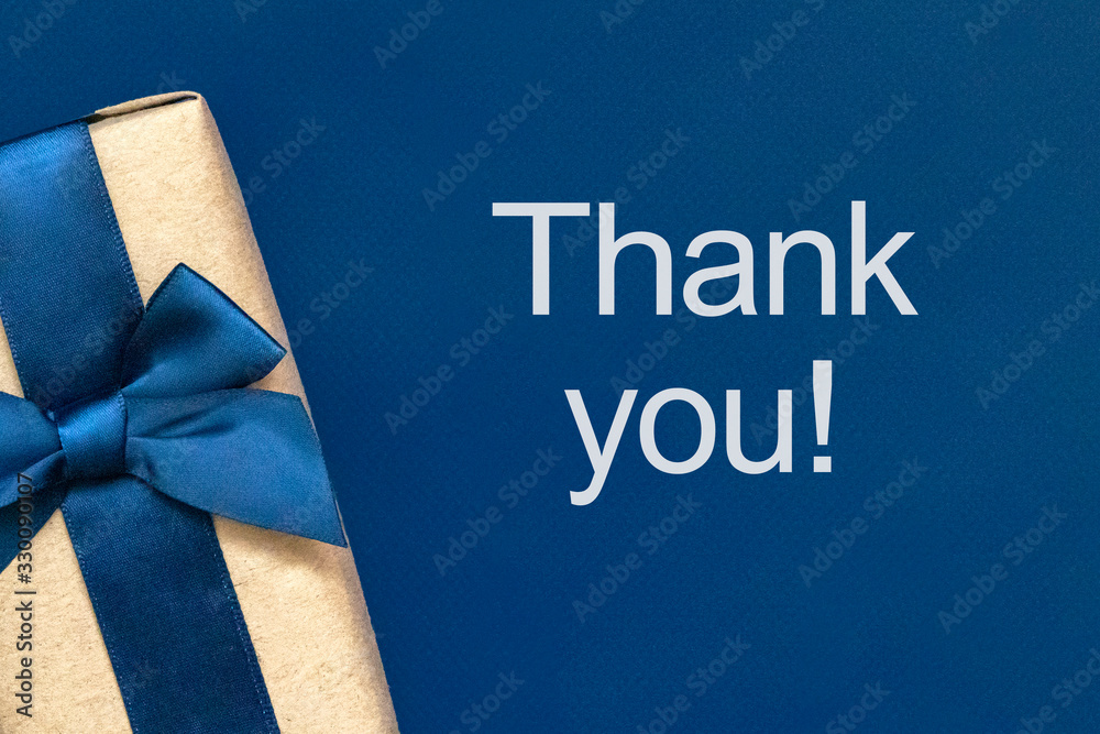 "Thank You" text with gift box. Banner with present. Classic blue ...