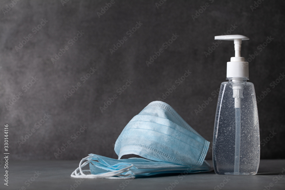 Sanitizer gel or antibacterial soap and face mask for coronavirus ...