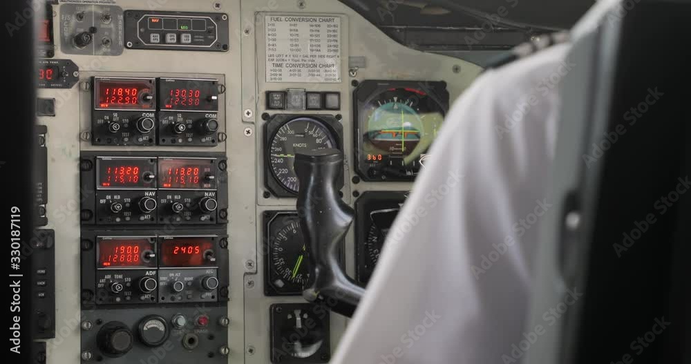 Pilot flying a plane with open cockpit, aircraft and instrument board ...