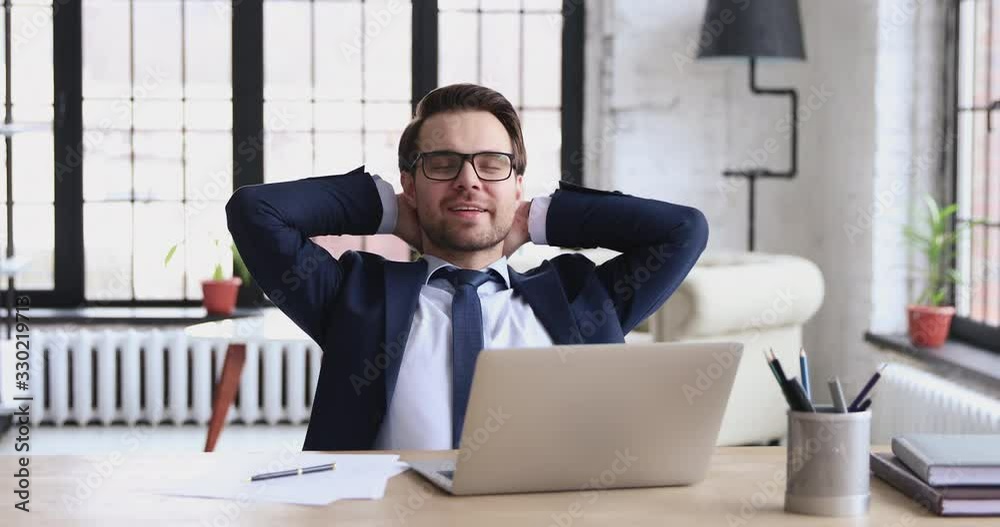 Successful happy businessman executive relaxing satisfied with work ...