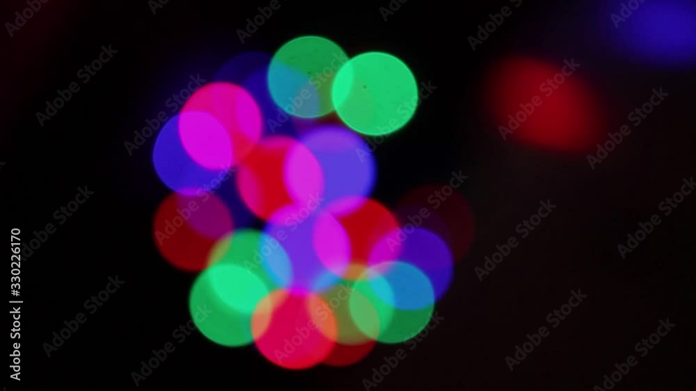 Motion blurred of an RGB (red, green, blue) light at night background ...