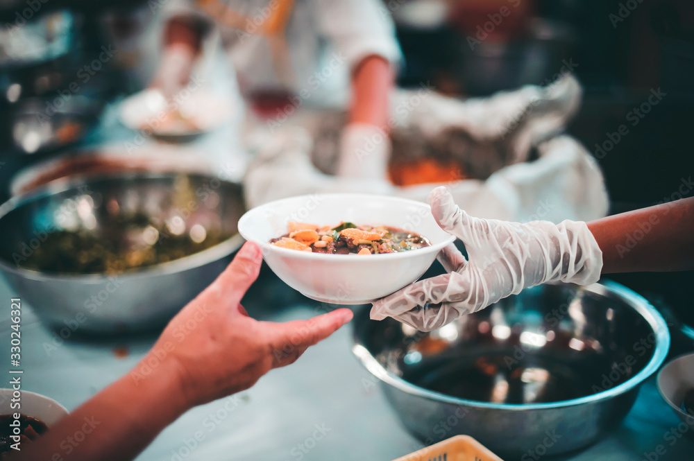 Providing free food for the poor to fill their stomachs and alleviate ...