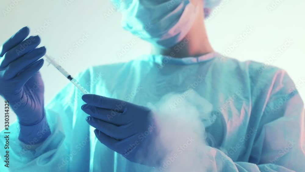 Epidemic disease prevention. Clinical immunization. Nurse in PPE ...