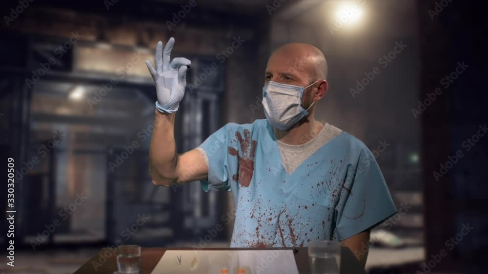 Surgeon evil doctor wearing mask gown covered in blood holds virus red ...