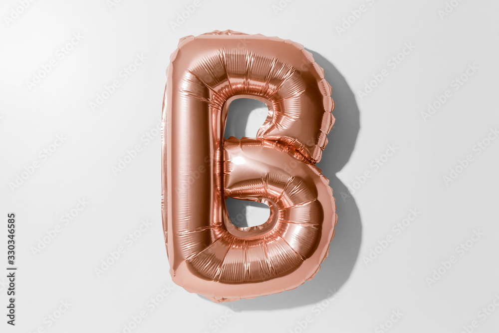Letter B, Rose gold foil balloon alphabet isolated on white background ...