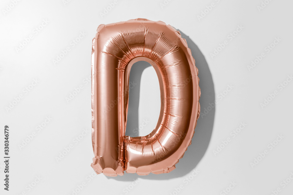 Letter D, Rose gold foil balloon alphabet isolated on white background ...